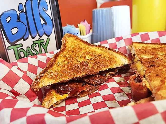 The patty melt achieves that perfect golden-brown crust that only comes from a well-seasoned griddle and experienced hands.