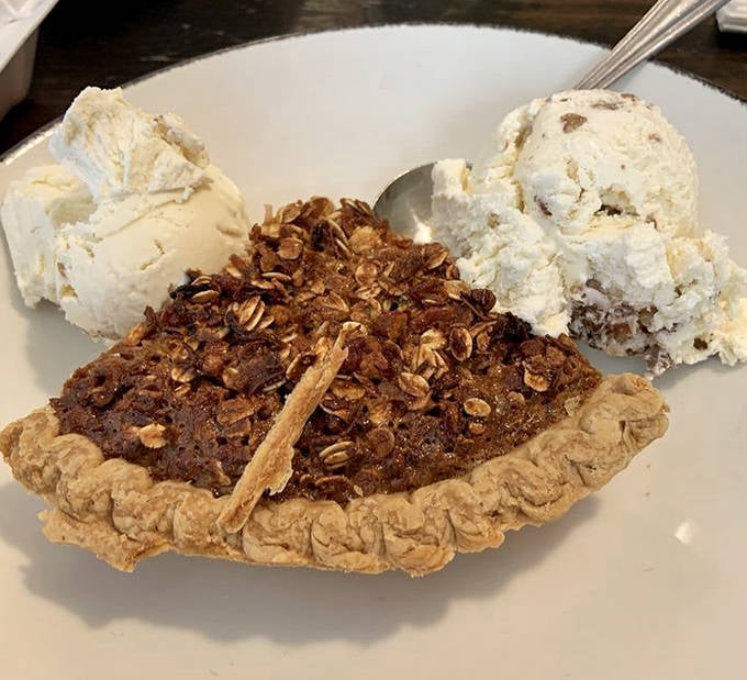 A golden-crusted marvel topped with crunchy oats and served with generous scoops of ice cream &ndash; dessert nirvana achieved!