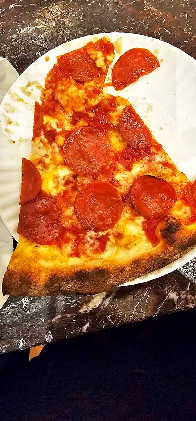 This pepperoni slice has achieved the perfect ratio of sauce, cheese, and meat &ndash; those crispy-edged pepperoni cups are little pools of flavor heaven.