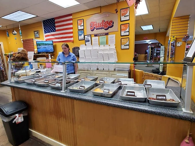 Behind the counter, friendly staff stand ready to help you navigate the tough choices between maple walnut and chocolate peanut butter fudge.
