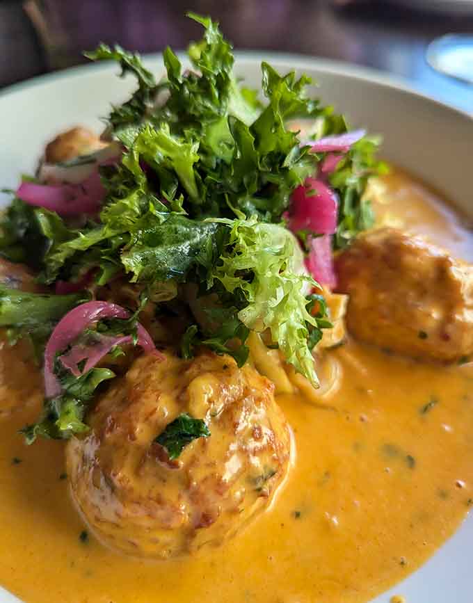 Chicken bacon meatballs swimming in sauce that makes you wonder why all meatballs can't be this good.