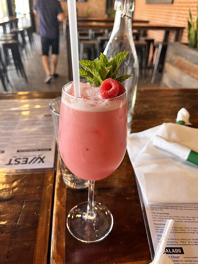 The Pink Panther cocktail doesn't just look pretty, it tastes like summer romance and pairs dangerously well with everything on the menu.