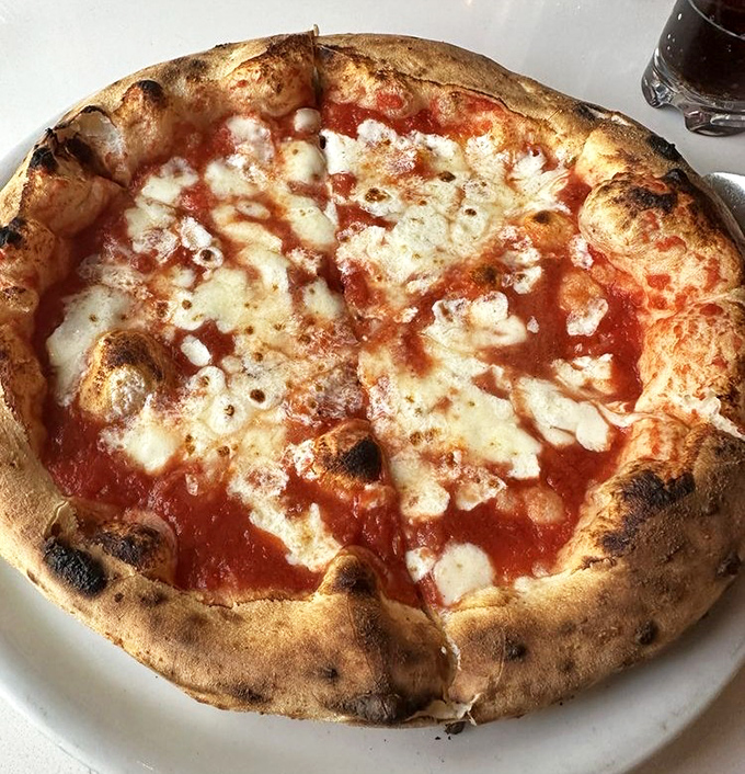 Pizza: A perfect Neapolitan-style masterpiece with that coveted leopard-spotted crust and just the right ratio of sauce to cheese &ndash; pizza in its purest form.
