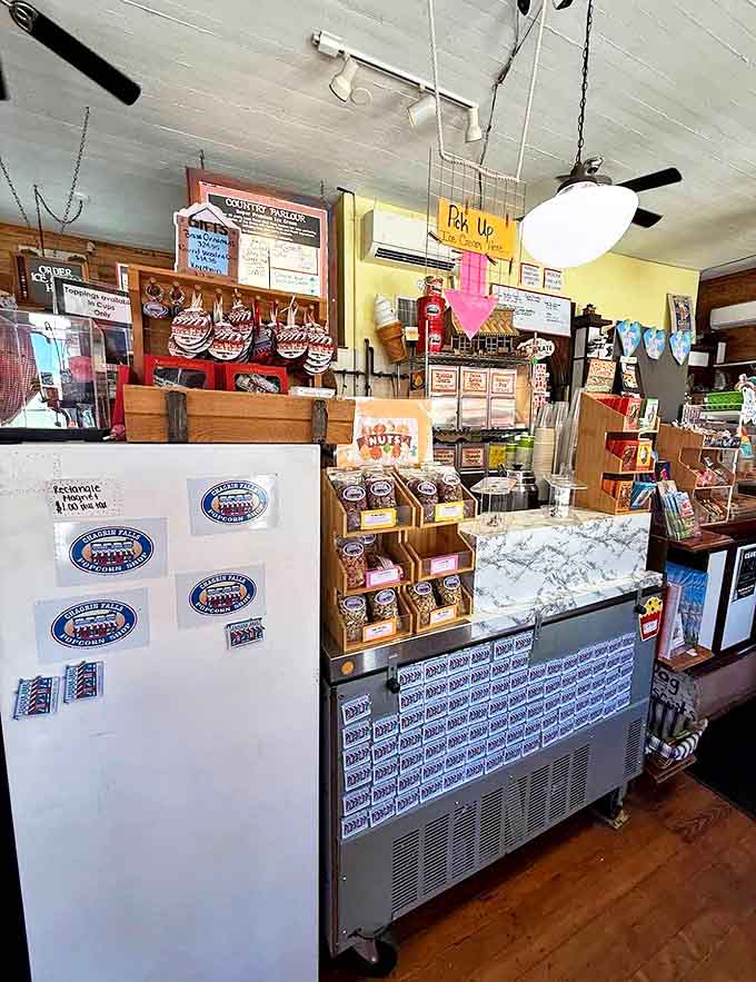 Behind this counter, popcorn wizards transform humble kernels into crunchy gold while sharing local gossip and weather predictions free of charge.