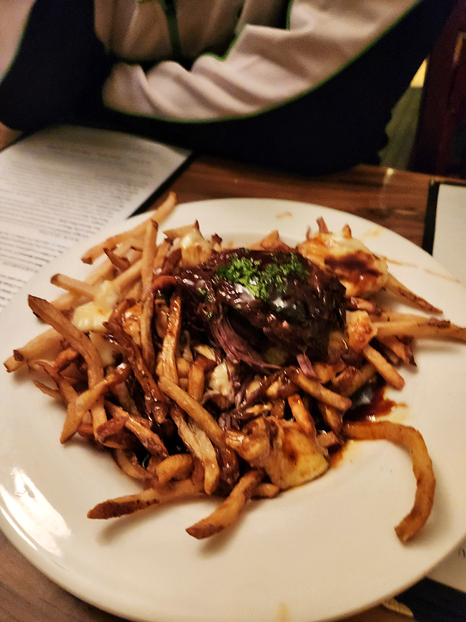 Poutine that would make Canadians weep with joy&mdash;hand-cut fries swimming in gravy with cheese curds playing lifeguard.