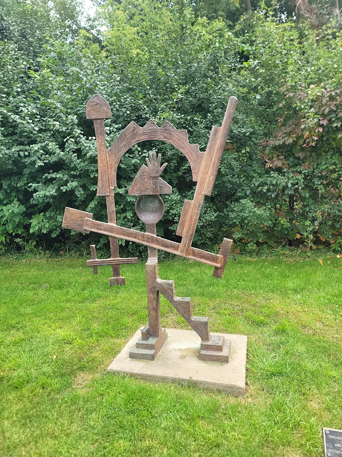 This playful wooden creation looks like it escaped from a modernist's sketchbook to take up residence among the trees.