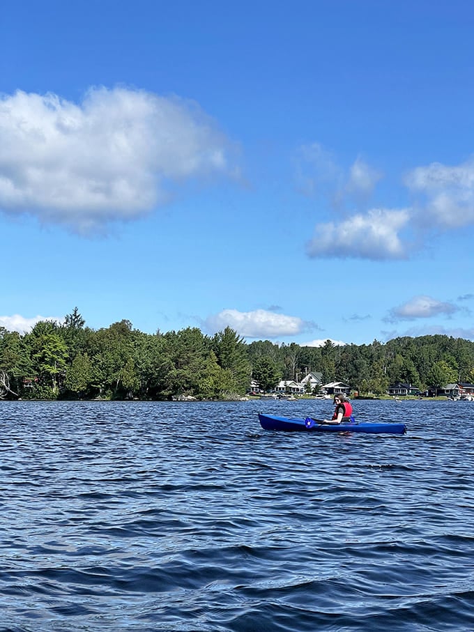 Kayaking across Rangeley's calm waters beats sitting in traffic back home, and the views aren't bad either, obviously.