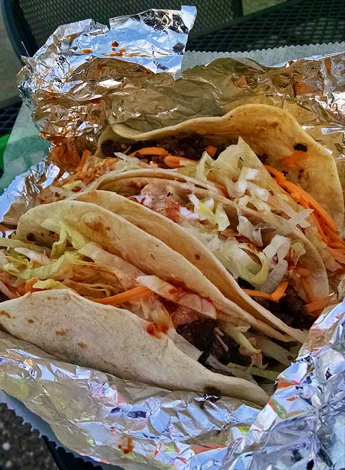 These tacos lined up like little soldiers of flavor are ready to march straight into your heart and stomach simultaneously.