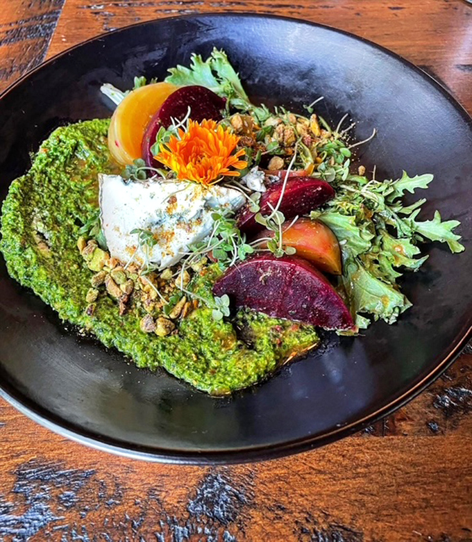 Even the salads deserve attention, with this artistic arrangement of greens, beets, and cheese showcasing Vermont's agricultural bounty.