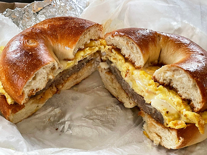Breakfast sandwich bliss &ndash; golden-toasted bagel embracing eggs, meat, and cheese in a morning miracle that's available all day.