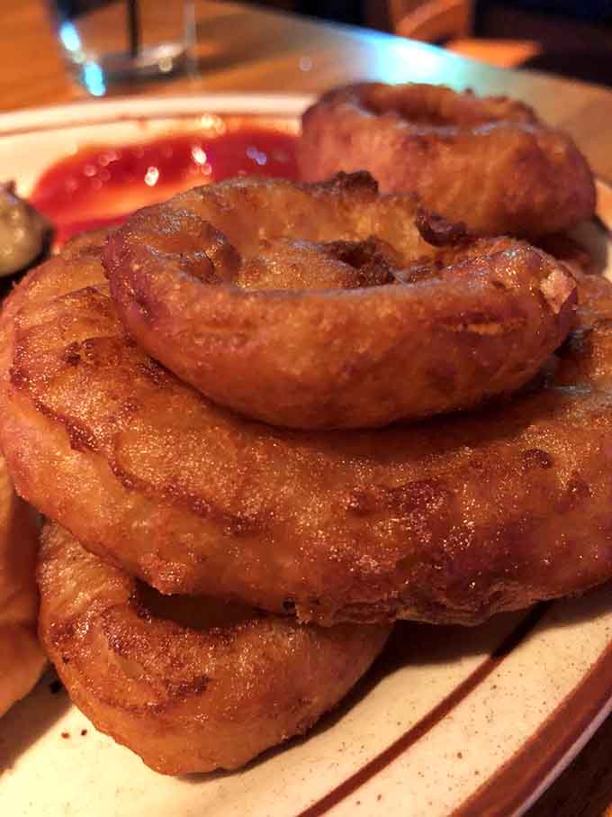 These thick-cut onion rings achieve that perfect snap when you bite through the golden batter to reach the sweet onion inside.