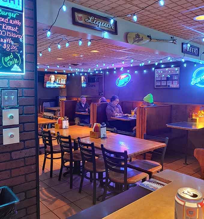 The dining room buzzes with that perfect neighborhood restaurant energy where everyone feels like a regular from day one.