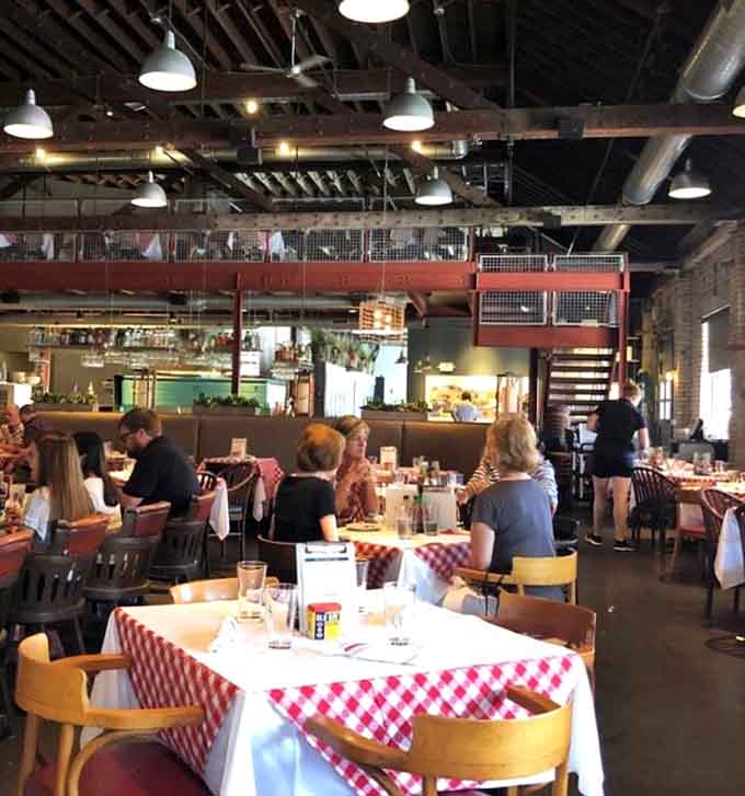 The dining room buzzes with the kind of energy that only happens when everyone's eating something that makes them genuinely happy about life.