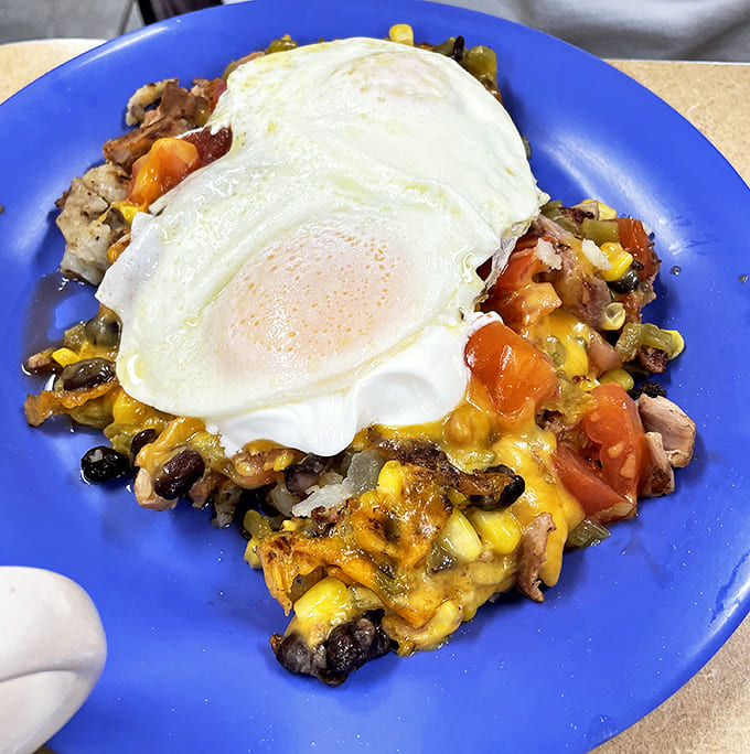 This smoked chicken skillet topped with a perfect sunny-side-up egg is what happens when breakfast and lunch stop competing and start collaborating.