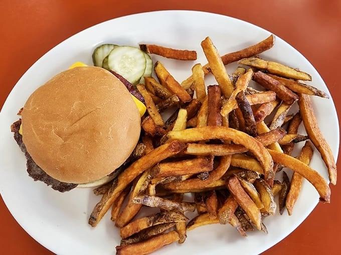The burger and fries demonstrate that lunch foods absolutely belong at breakfast, especially when cooked this well and served this generously.