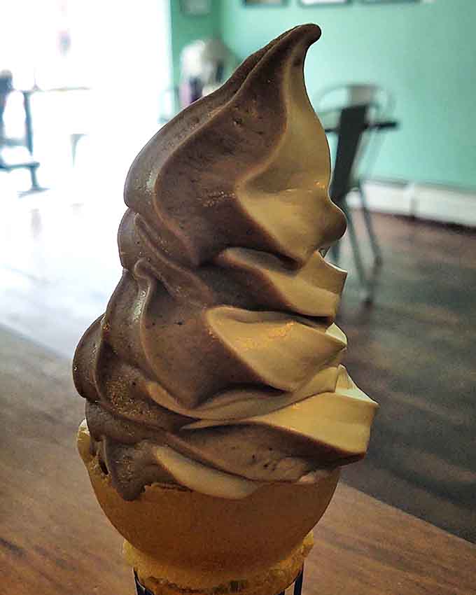 Soft-serve ice cream swirled to architectural perfection offers sweet relief on warm Vermont afternoons.