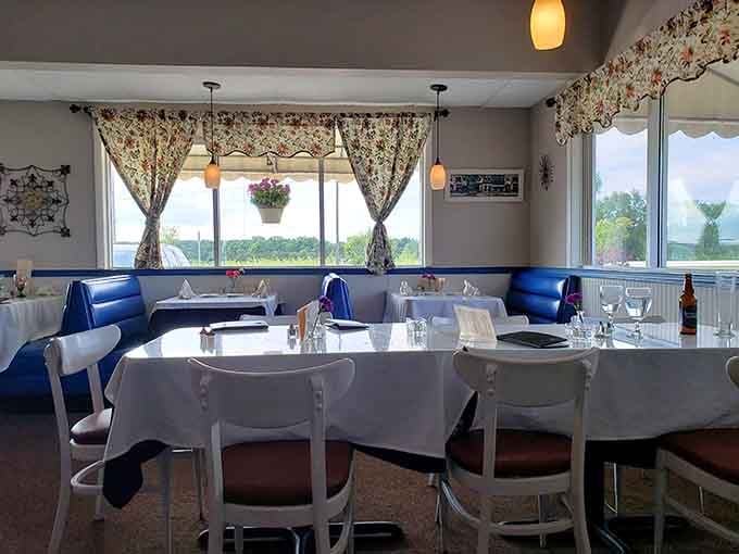 Natural light streams through generous windows, creating the perfect backdrop for leisurely meals and good conversation with friends.