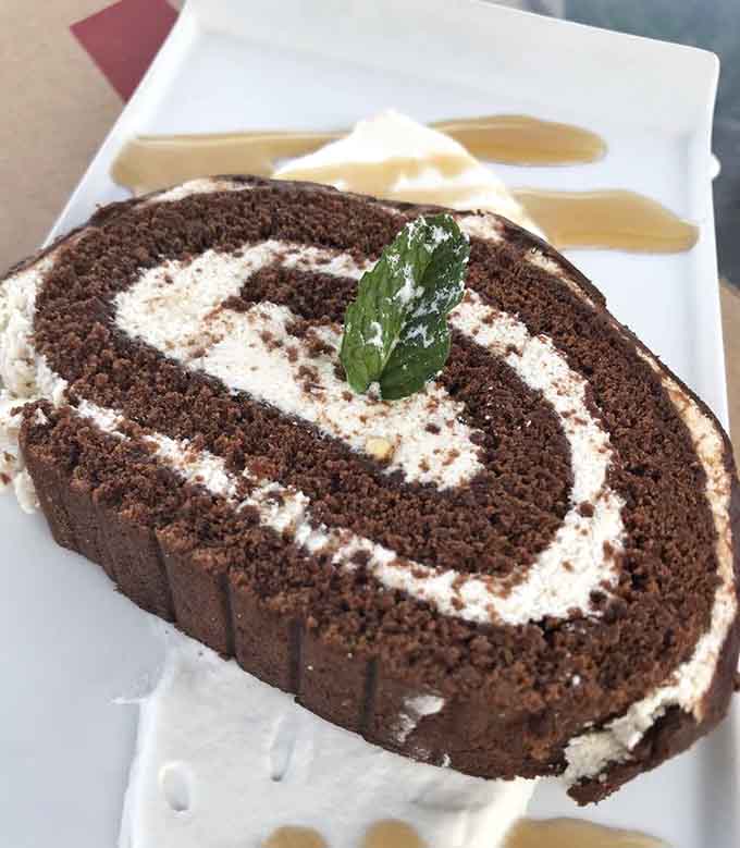 Chocolate cake roll delivers the kind of dessert that makes you glad you saved room, even when you didn't.