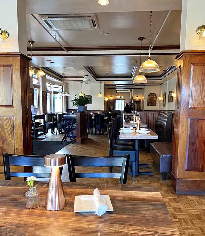 Spacious dining room with quilted leather booths where countless lobster taco revelations have occurred over the years.