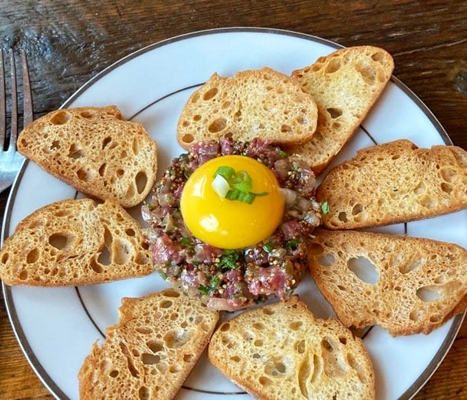 Beef Tartare with a golden yolk and toasted bread, because sometimes raw is exactly how you want your meat prepared.