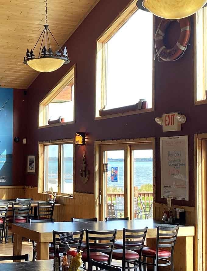 Those windows aren't just for show, they're your front-row seats to the greatest maritime parade in Michigan's Upper Peninsula.