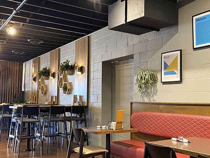 Clean lines and warm wood create a dining environment that's both contemporary and welcoming, like a hug from a very stylish friend.