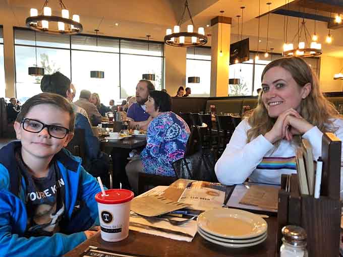 Happy diners enjoying the kind of meal that turns a regular evening into a memorable one.