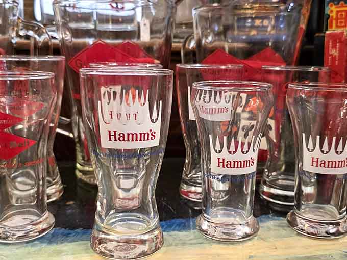 Hamm's beer glasses lined up like soldiers prove that even everyday drinkware used to be crafted with care and designed to last through countless toasts.