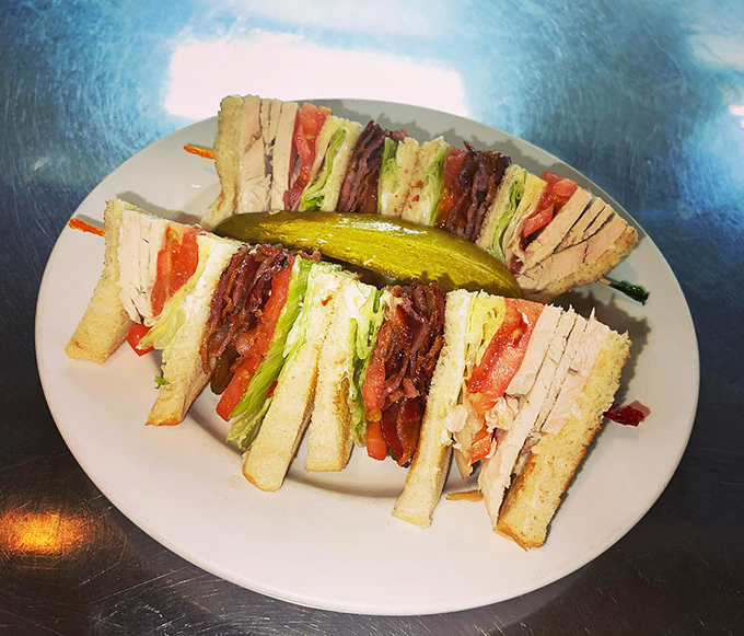 Three layers of sandwich perfection! This club is so tall, it needs its own elevator. Don't forget to unhinge your jaw before attempting.