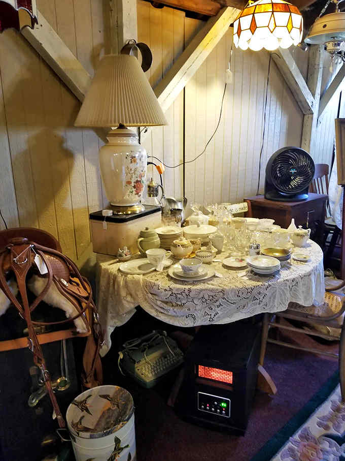 Porcelain treasures and vintage tableware arranged with care &ndash; each piece survived decades of use before landing in this cozy display.