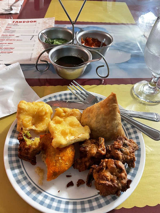 Who needs meat when veggies taste this elite? This platter's so colorful, it could double as a Holi festival celebration!