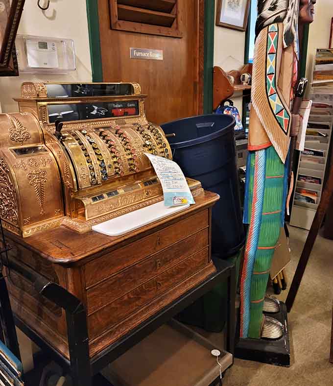 An ornate antique cash register that's infinitely more beautiful than any modern payment system, when even money-counting machines deserved to be gorgeous.