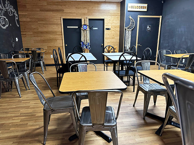 The chalkboard wall cheerfully reminds you they've got coffee, because even waffle enthusiasts need caffeine to function properly.