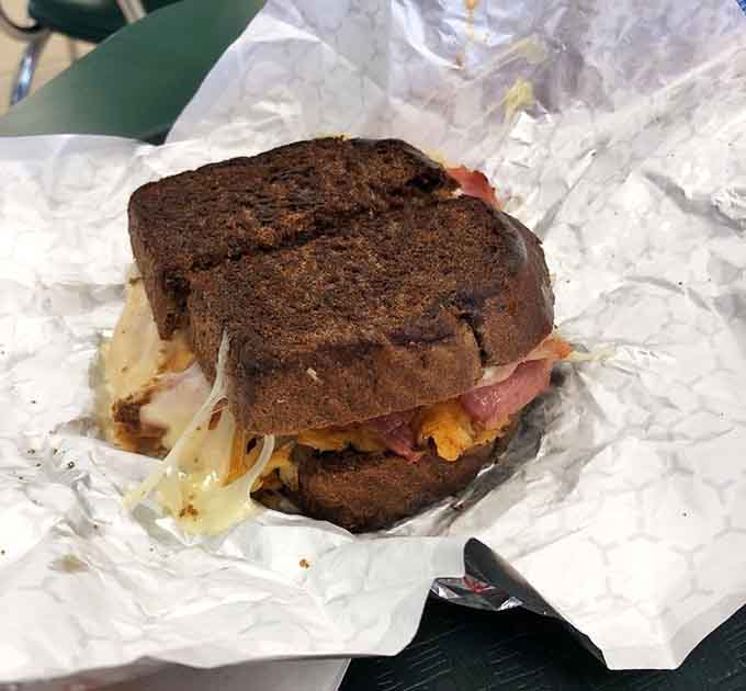 The Reuben on dark rye proves that corned beef deserves just as much love as its roasted cousin.