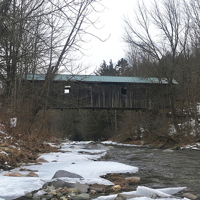 Winter transforms the gorge into a crystalline wonderland. The same spot that hosts summer swimmers now showcases nature's ice sculptures.