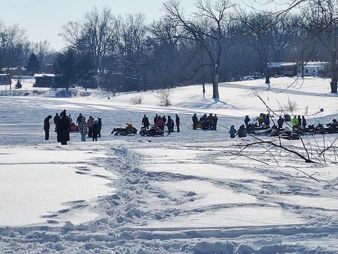 Winter transforms the landscape into a snowy playground where snowmobiles reign supreme and hot cocoa becomes essential equipment.