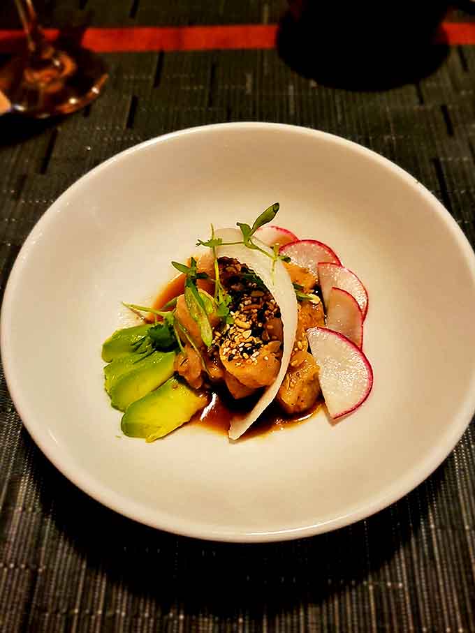 Yellowtail sashimi that's dressed for success &ndash; avocado, radish and microgreens turning raw fish into a fashion statement.