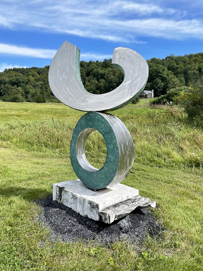 This sculpture's reaching for the sky like me after spotting the last slice of pie at a diner.