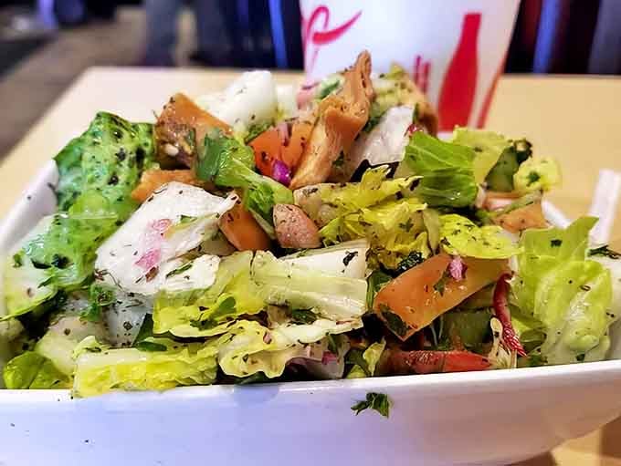 This isn't just any salad &ndash; it's a Mediterranean symphony of crisp vegetables, herbs, and a dressing worth bottling and taking home.