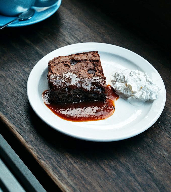 Chocolate nirvana achieved &ndash; this brownie's crisp top gives way to fudgy depths, with caramel and whipped cream providing the perfect finishing touches.