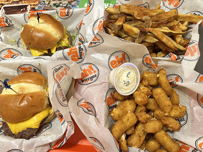 The full burger experience: perfectly cooked patties, golden fries, and those addictive cheese curds that disappear faster than you'd expect.