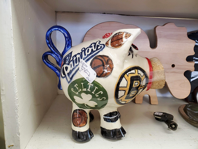 This whimsical ceramic piggy bank sporting Boston sports team logos combines local pride with vintage charm, a conversation starter for any New England home.