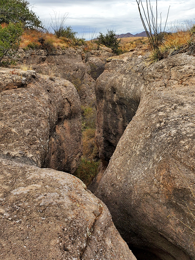 Dramatic rock formations create natural passageways, whispering geological stories that span millions of years of Earth's history.