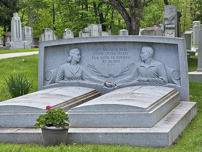Set me as a seal upon thine heart &ndash; this touching monument depicts a couple holding hands for eternity.