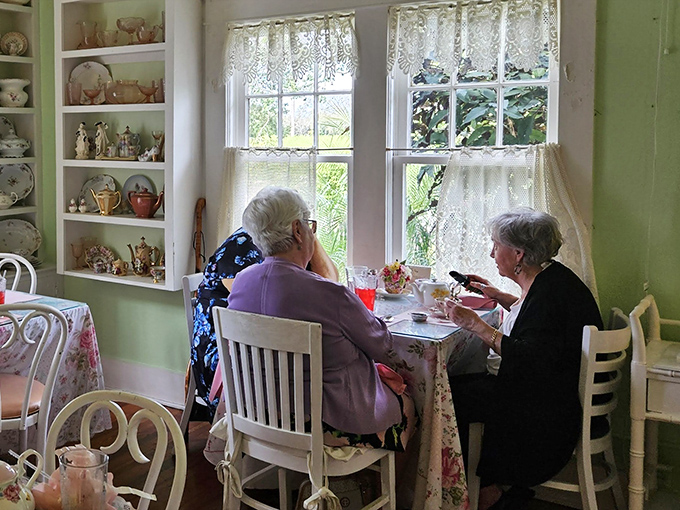 Regular patrons enjoy their teatime ritual, proving that in our fast-paced world, the art of conversation over a leisurely meal still thrives.