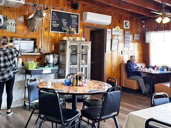 Wood-paneled walls adorned with local memorabilia create the authentic atmosphere that chain restaurants try desperately to imitate.