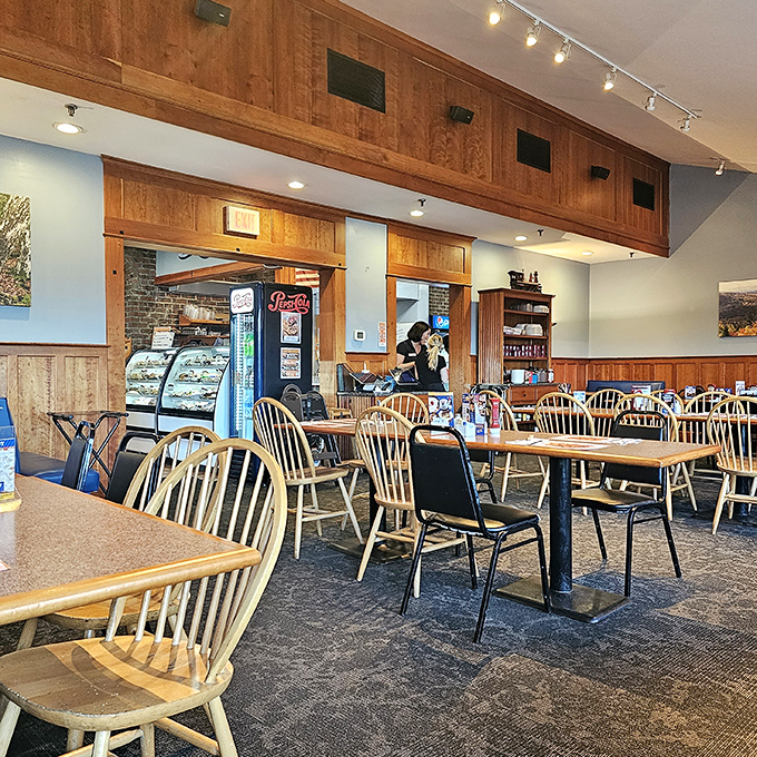 The dining area's vaulted ceiling and natural light create an unexpectedly airy space where you can linger over coffee and one more pie slice.