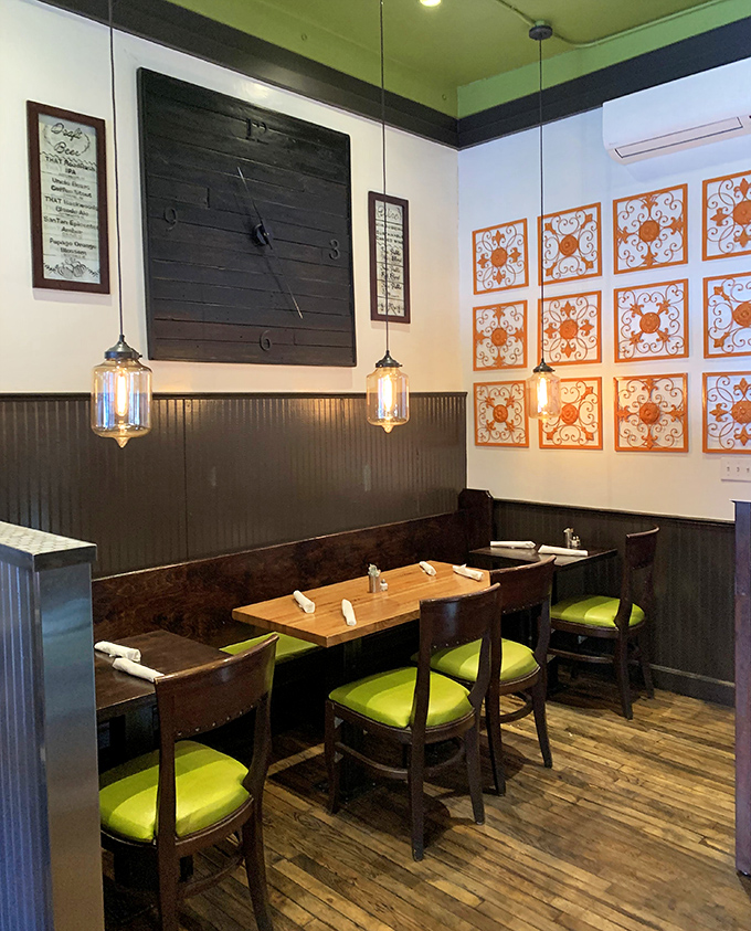 Thoughtful interior design creates intimate dining spaces, with decorative tiles and pendant lighting adding character to every corner.