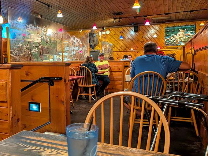 The dining room buzzes with conversation as patrons enjoy that rare combination of exceptional food and unpretentious atmosphere.