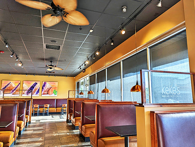 Leather booths invite lingering conversations over coffee refills &ndash; this is where "quick breakfast" turns into "let's order one more thing."